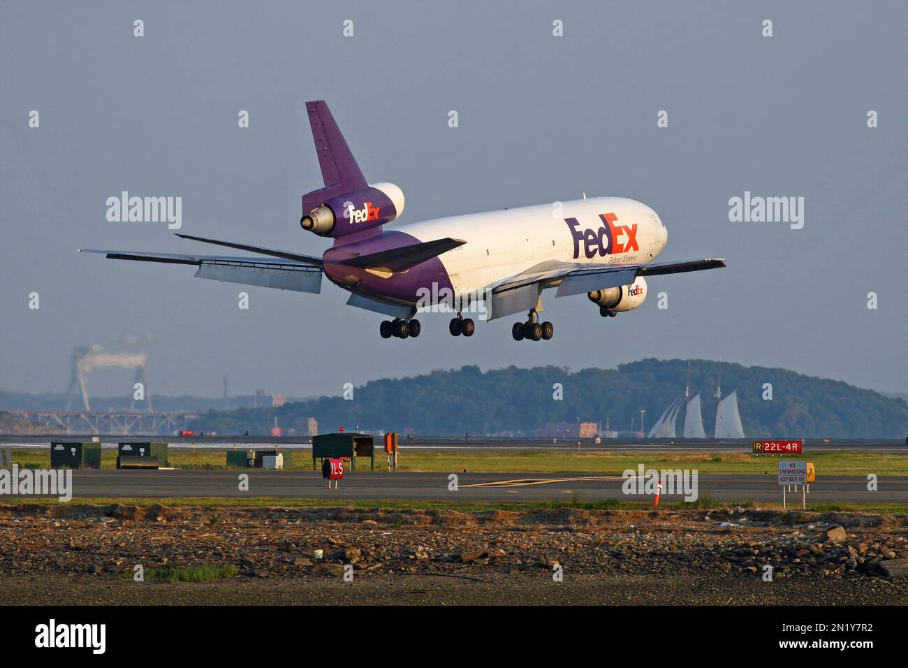 FedEx cargo mail freight plane lands on airport runway Stock Photo - Alamy