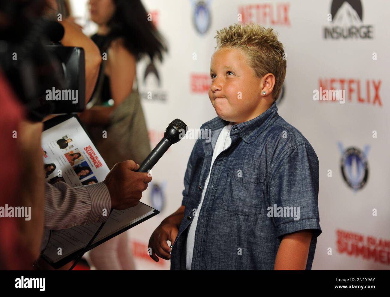 Actor Jackson Nicoll poses on the red carpet at the premiere of the ...