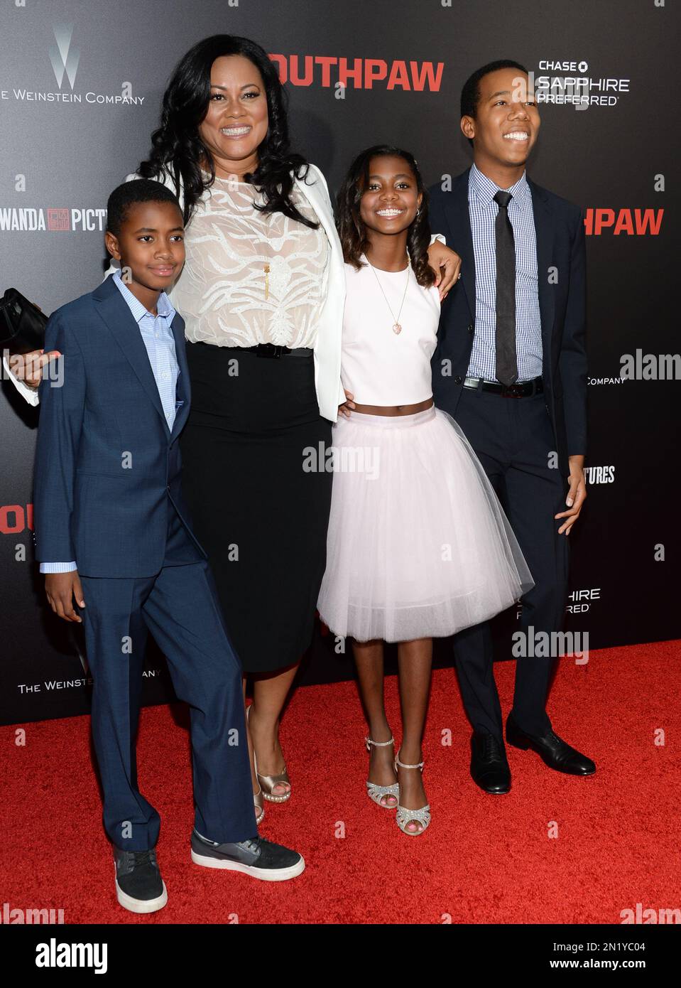 Brando Fuqua, left, Lela Fuqua, Asia Fuqua and Zachary Fuqua attend the ...