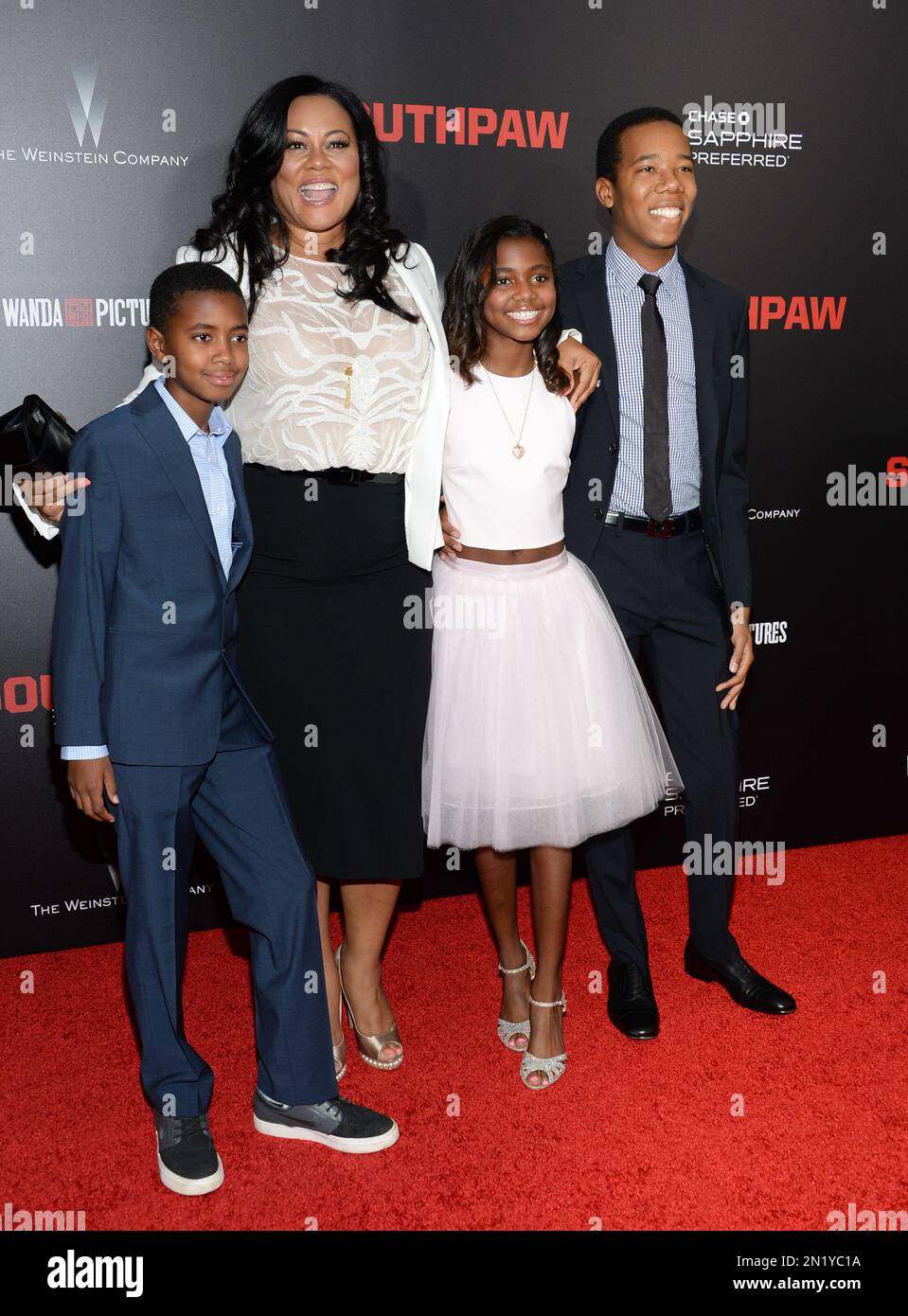 Brando Fuqua, left, Lela Fuqua, Asia Fuqua and Zachary Fuqua attend the ...
