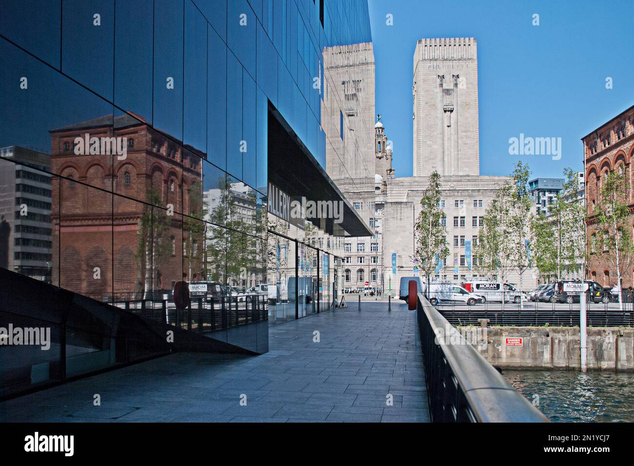 Reflections in the glass of the Open Eye Gallery & behind is the ...