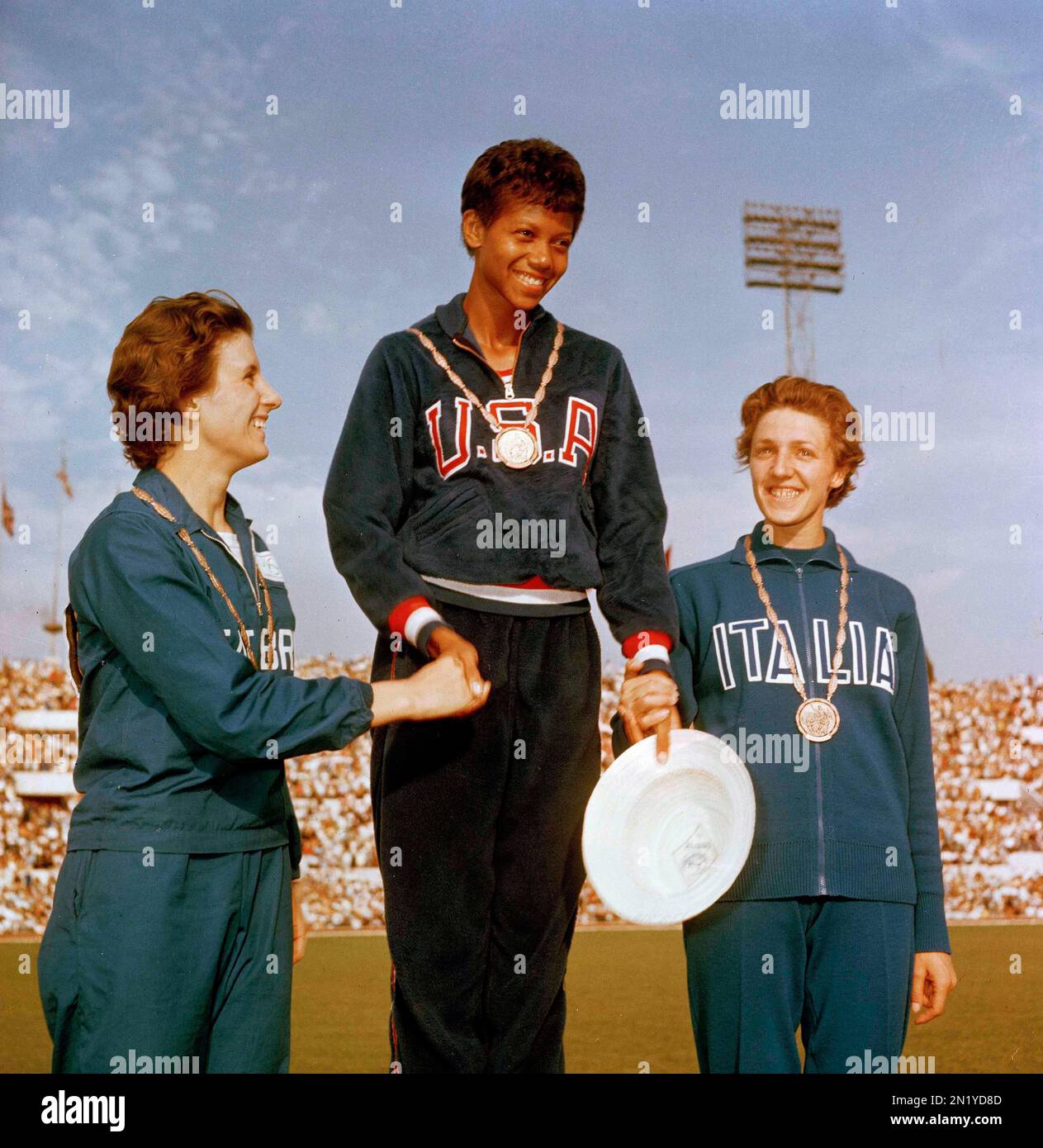 Gold medalist Wilma Rudolph of the United States is congratulated by ...