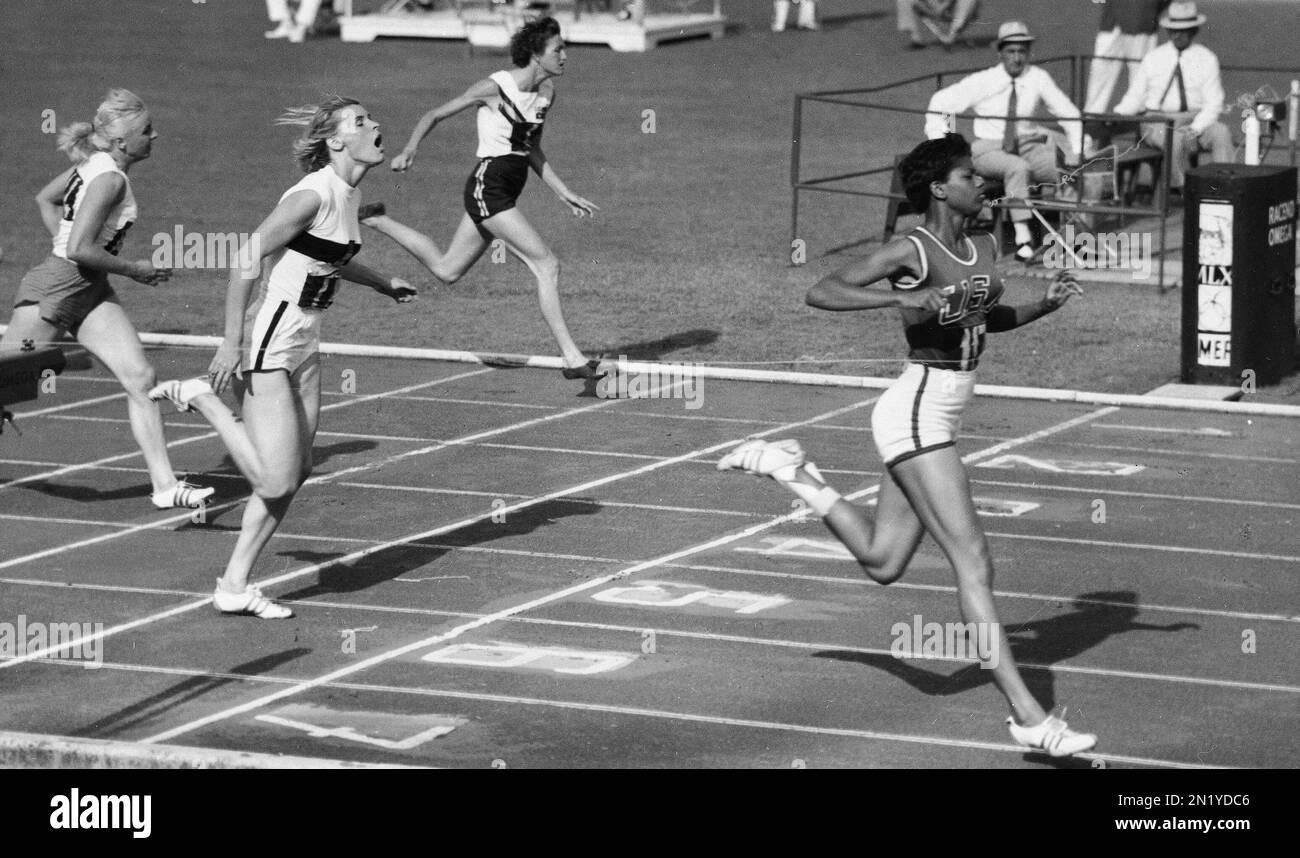 Wilma Rudolph of the United States, right, romps home to win her semi ...