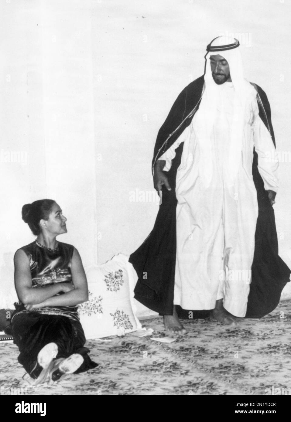 The ruler of Abu Dhabi, Sheikh Zayed bin Sultan Al Nahyan, looks down ...