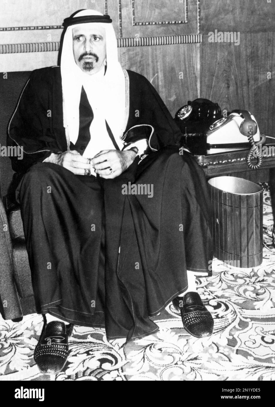 Sheikh Ahmad bin Ali al Thani, the Emir of Qatar seated during an ...