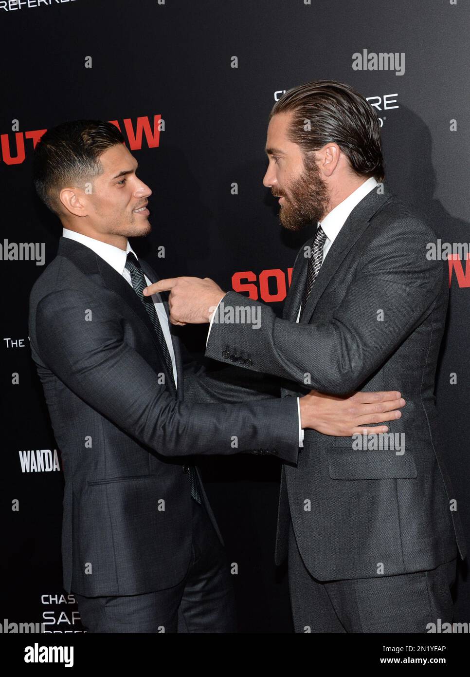 Jake Gyllenhaal, right, and Miguel Gomez attend the premiere of ...