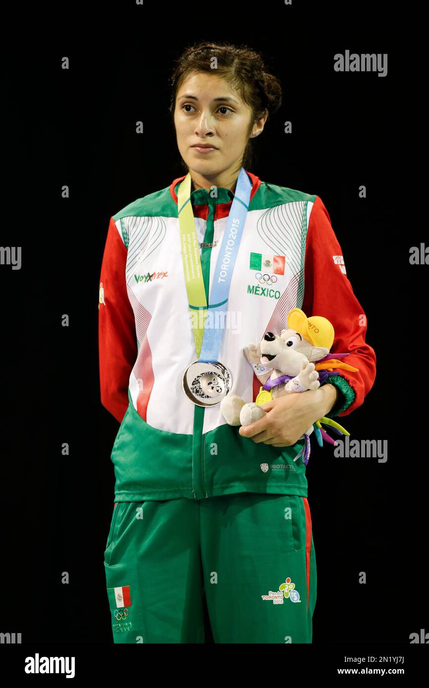 Silver medalist Mexico's Itzel Manjarrez wears her medal earned in the ...