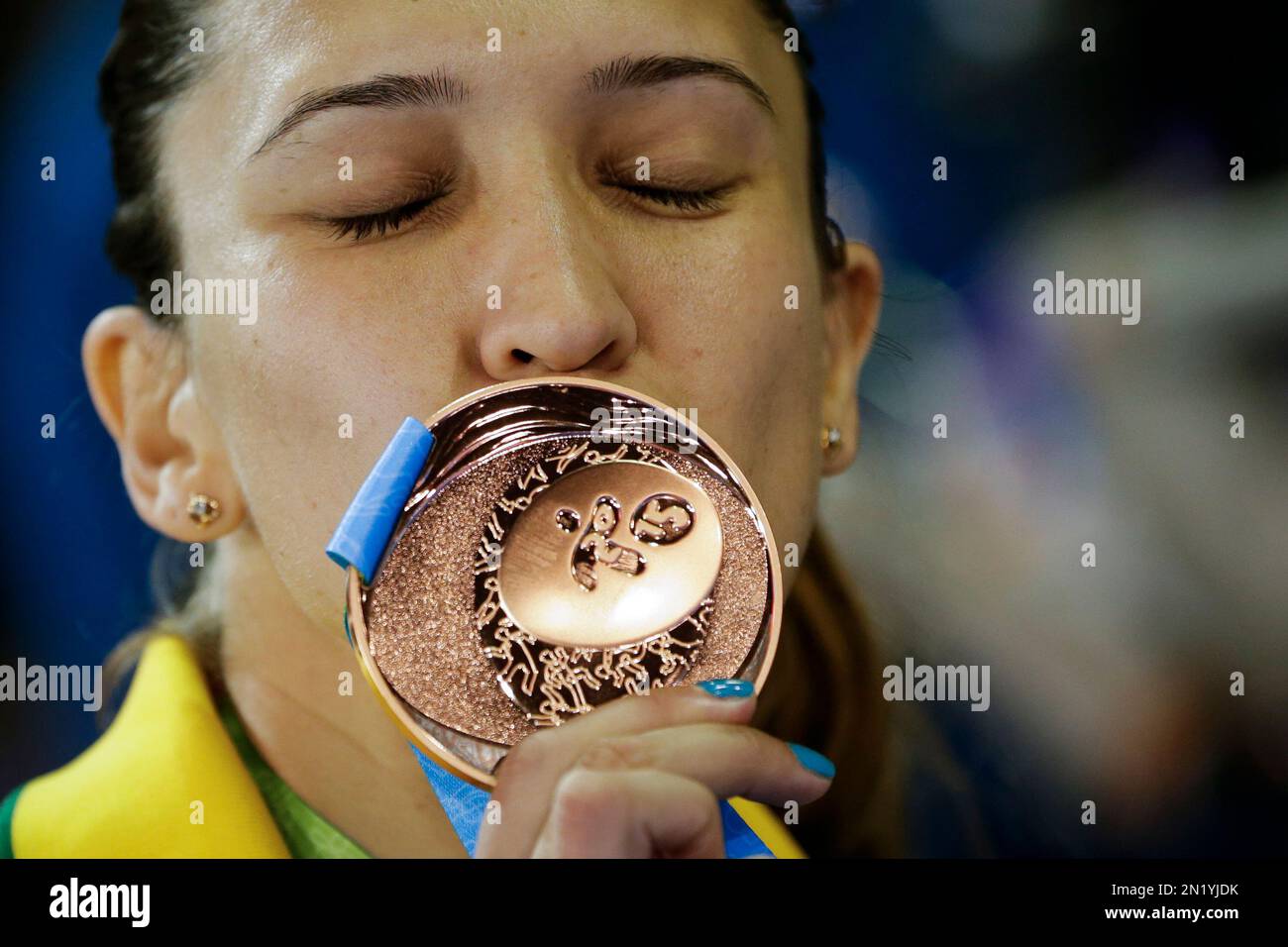 Brazil's Iris Silva kisses her bronze medal earned during the women's ...
