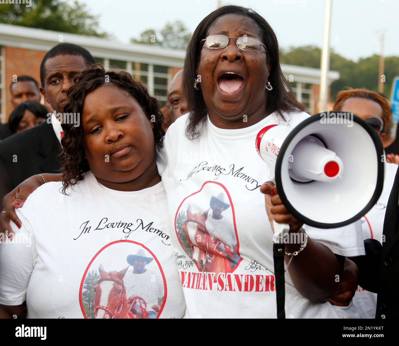 Frances Sanders, mother of Jonathan Sanders, hugs his sister Nicole ...