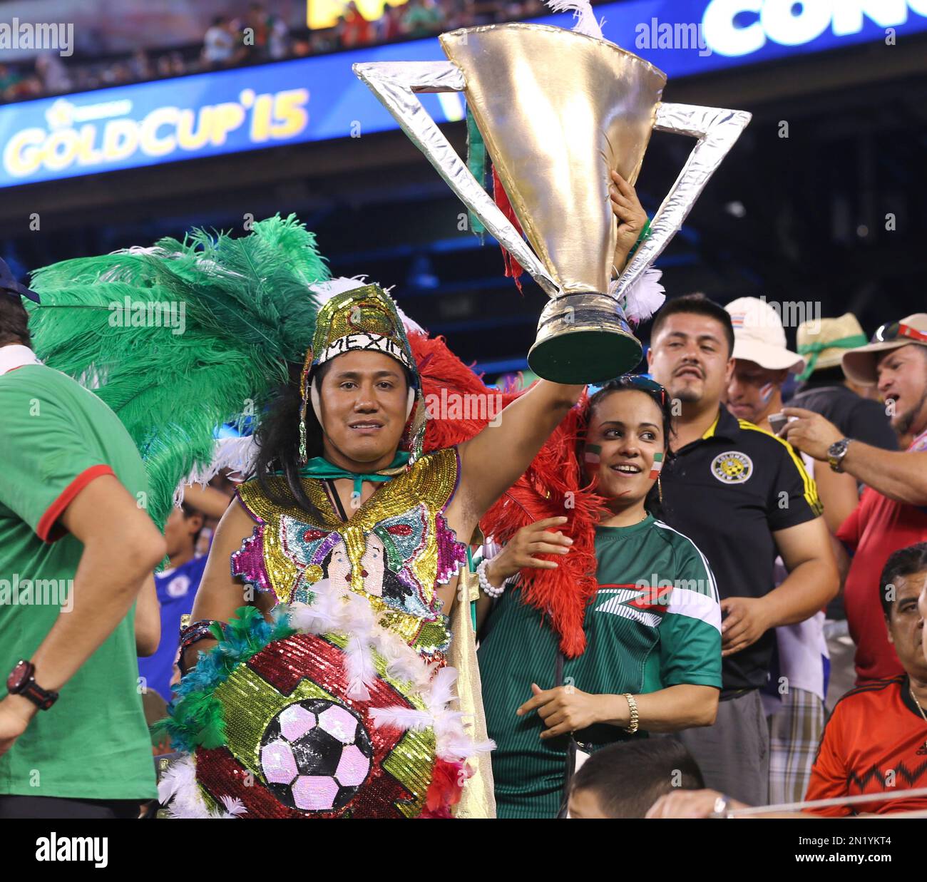 A fan poses for a photograph during the first half of a CONCACAF Gold ...