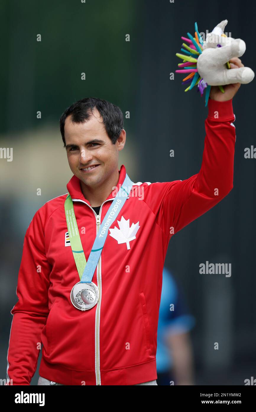 Canada's Luke Ramsay celebrates after winning the silver medal in the ...