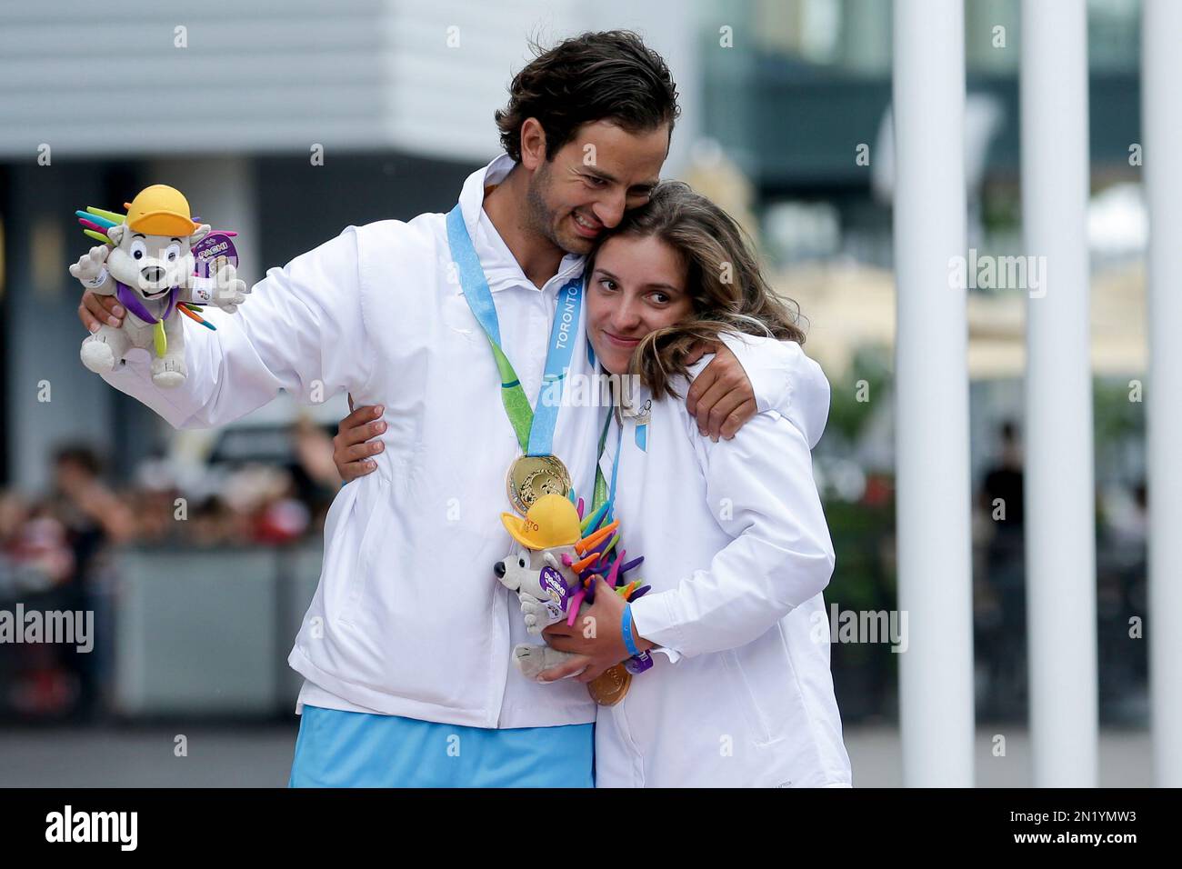 Guatemala's Jason Hess, left, and Irene Abascal celebrate their gold ...