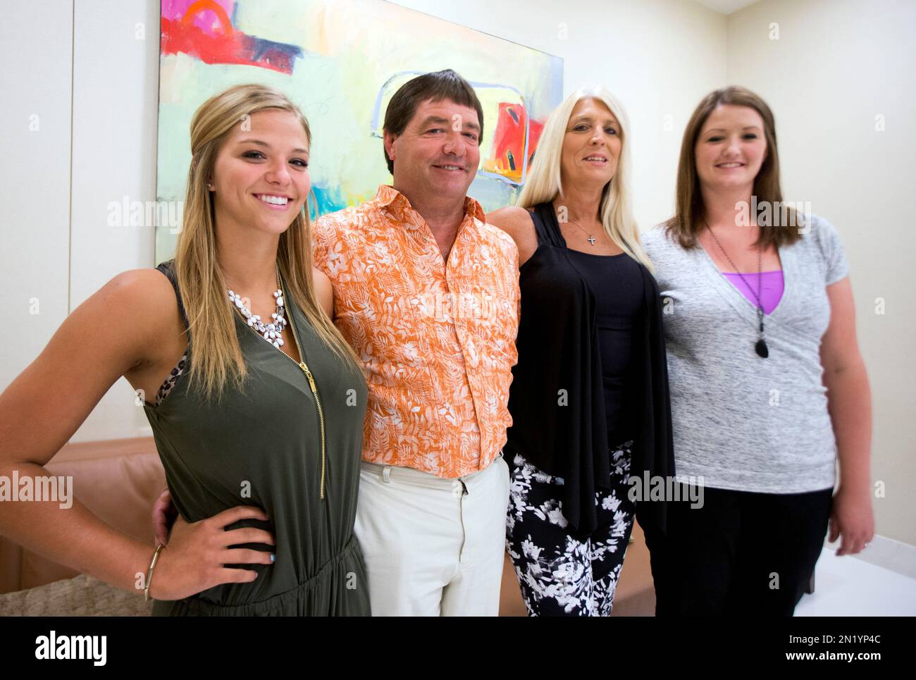 Dean DeMoe, second from left, with his family, from left, daughter ...