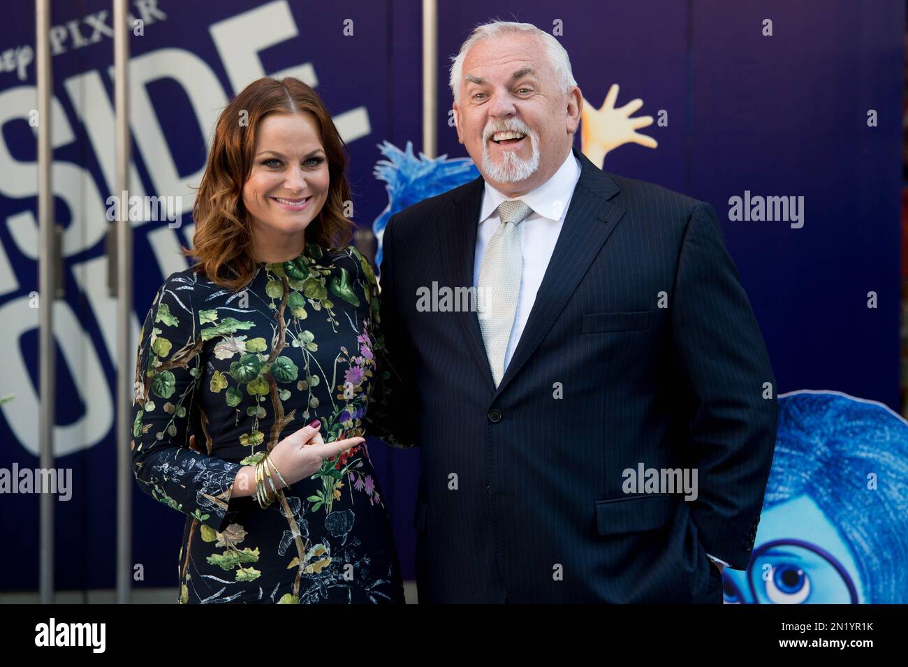 U.S actress Amy Poehler and John Ratzenberger arrive for the UK ...