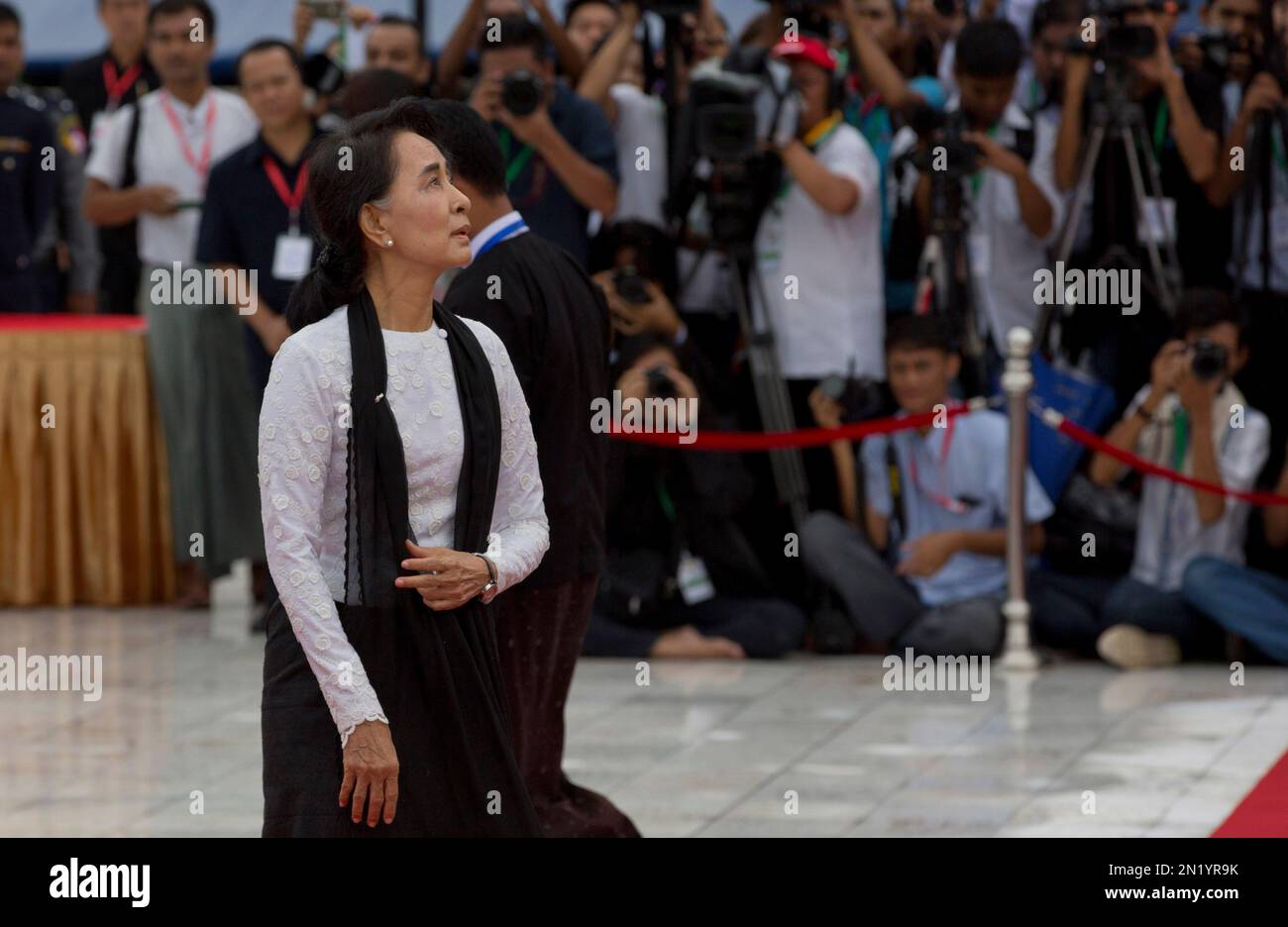 Myanmar opposition leader Aung San Suu Kyi pays respect at the tomb of ...