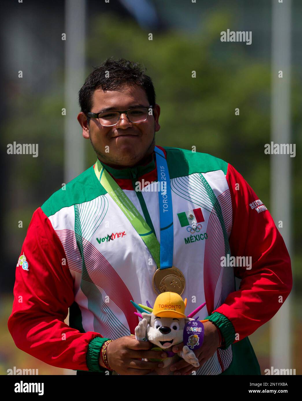 Mexico's Luis Alvarez smiles after receiving the gold medal for men's ...