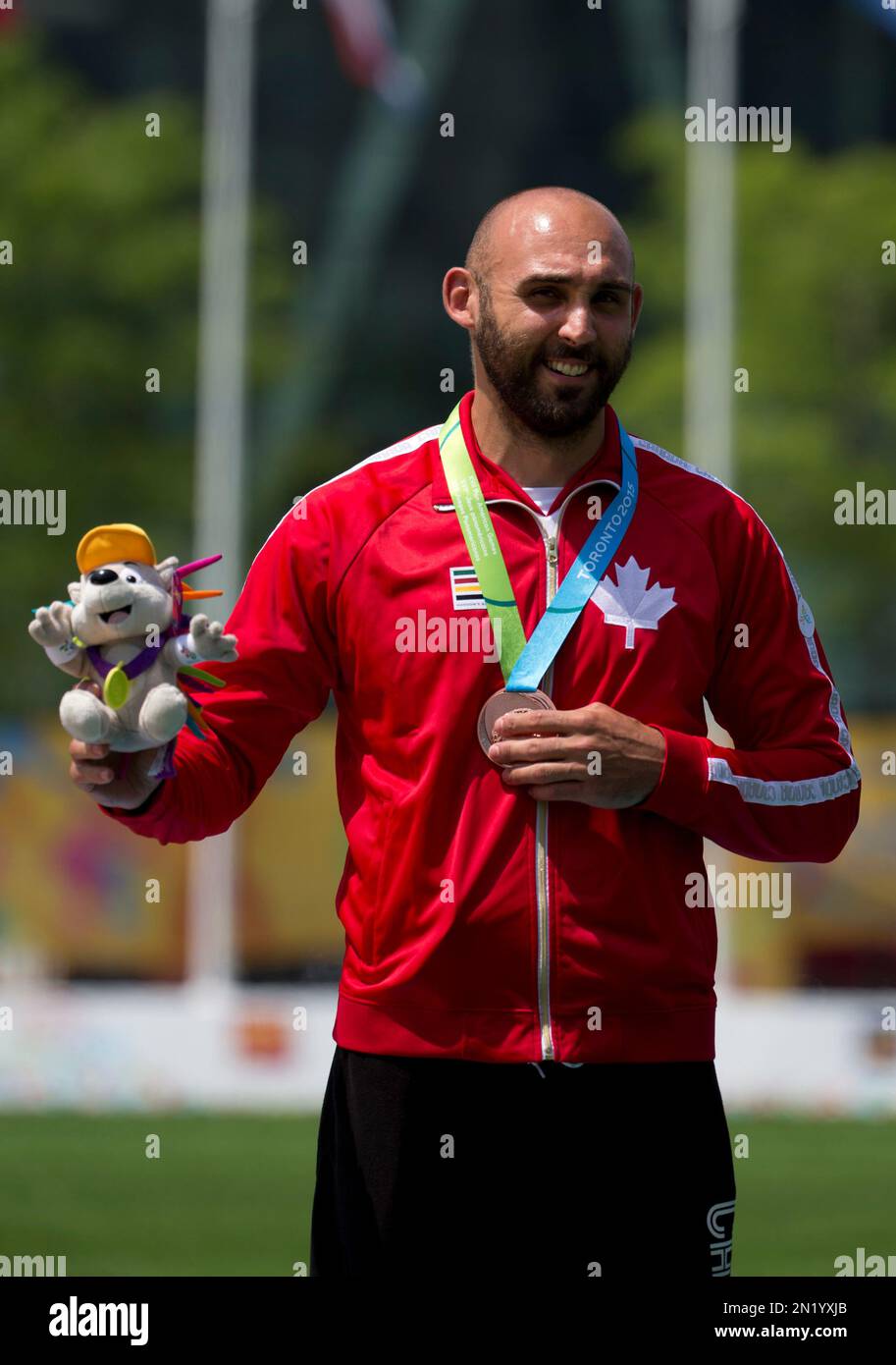 Canada's Jay Lyon stands on the podium after receiving his bronze medal ...