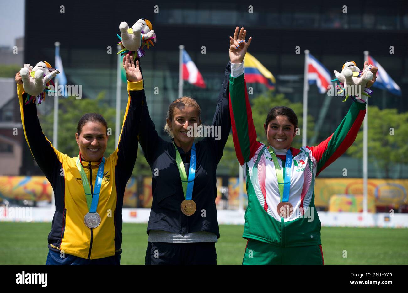 United States' Khatuna Lorig, center, winner of the gold medal for ...