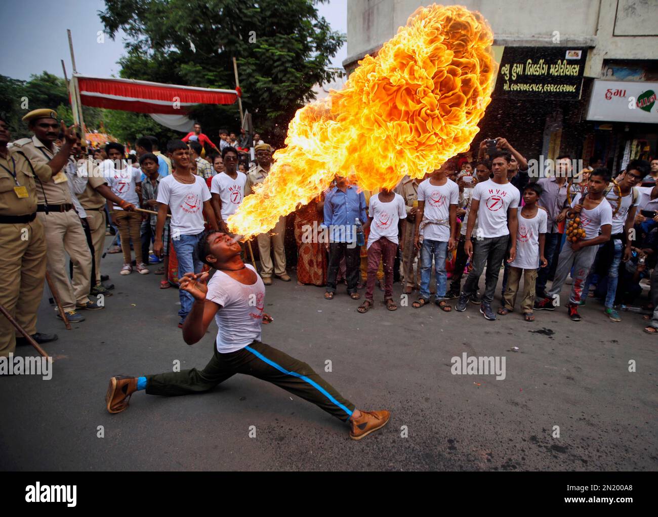 An Indian man performs fire stunt during the annual Rath Yatra or ...