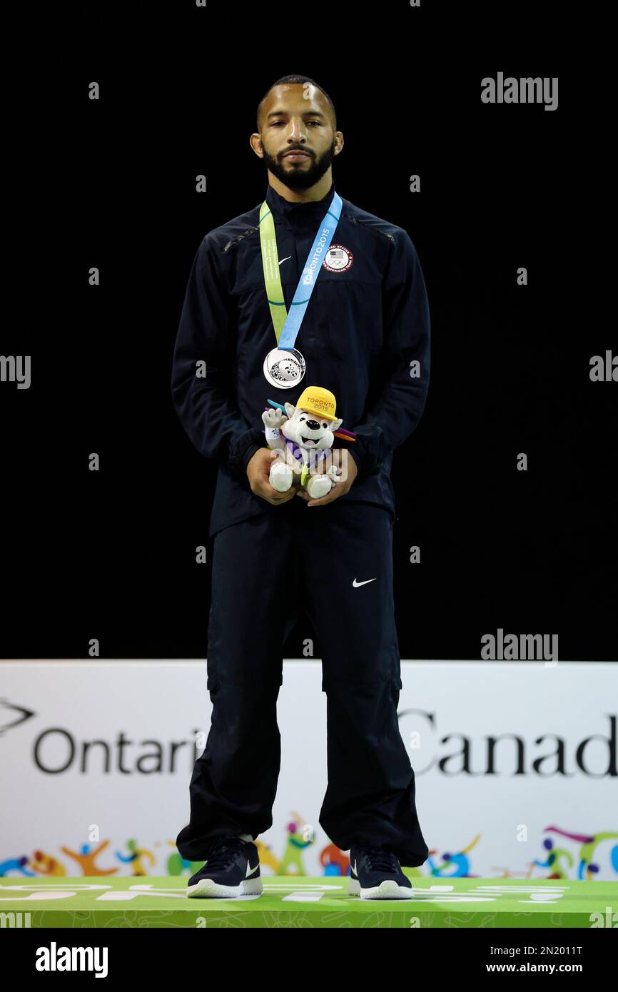The United States' Angel Escobedo poses wearing his silver medal after ...