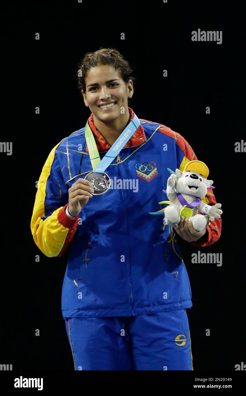 Venezuela's Maria Acosta poses with her silver medal after winning it ...