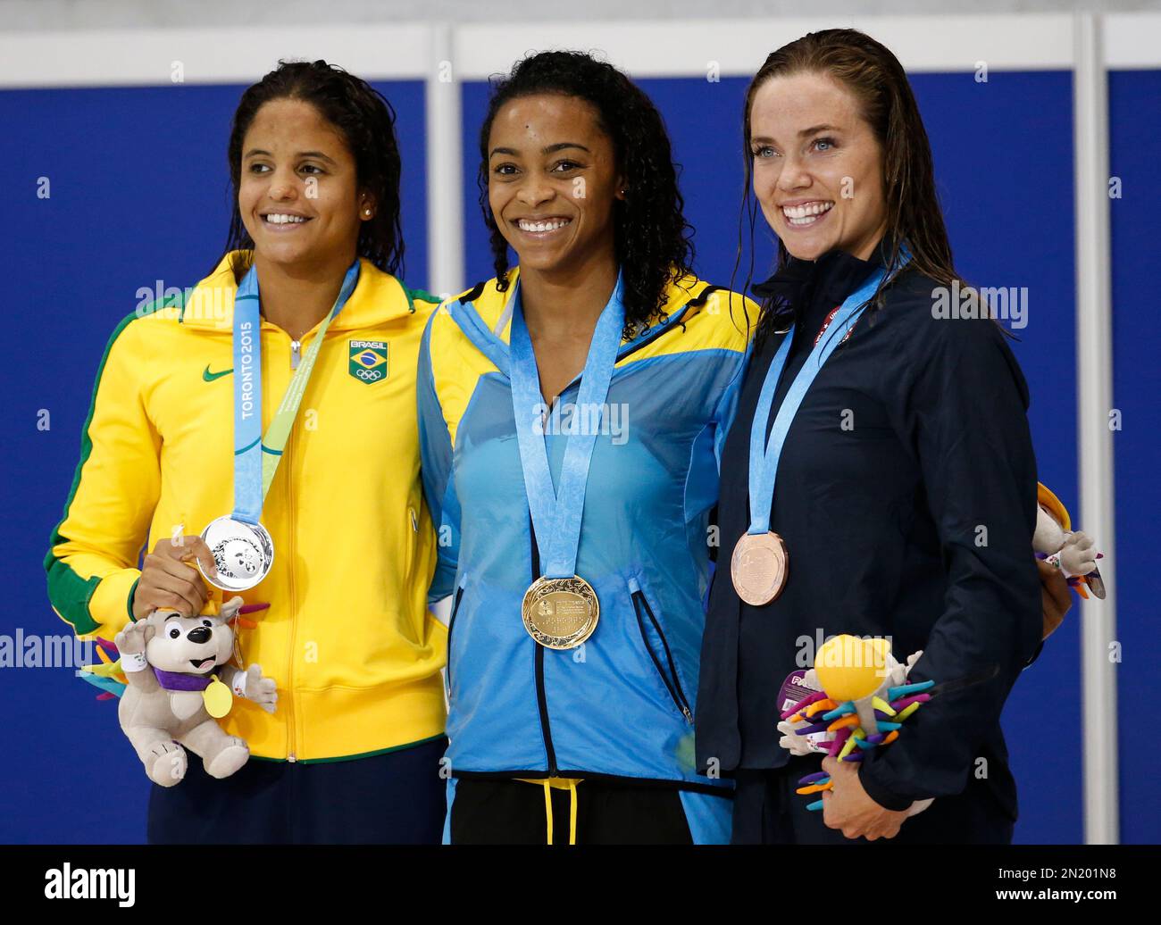 Gold medalist Arianna Vanderpool-Wallace, center, of the Bahamas, poses ...