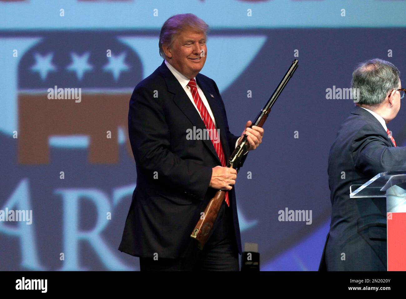 Republican presidential hopeful Donald Trump holds a Henry repeating ...