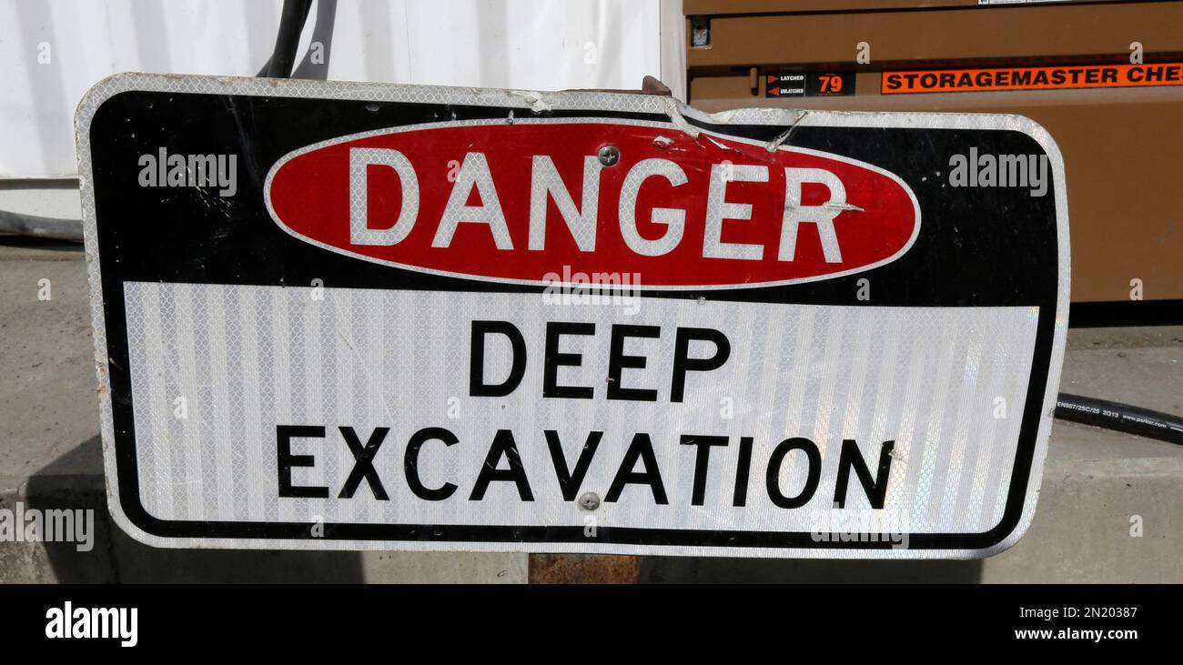 A currently unused sign is shown at the site of the tunnel being dug to ...