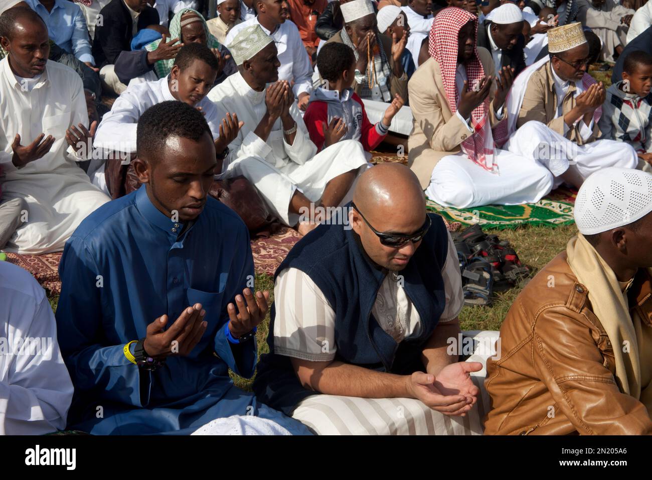 Kenyan Muslims offer their prayers in Nairobi, Kenya, Friday, July 17 ...