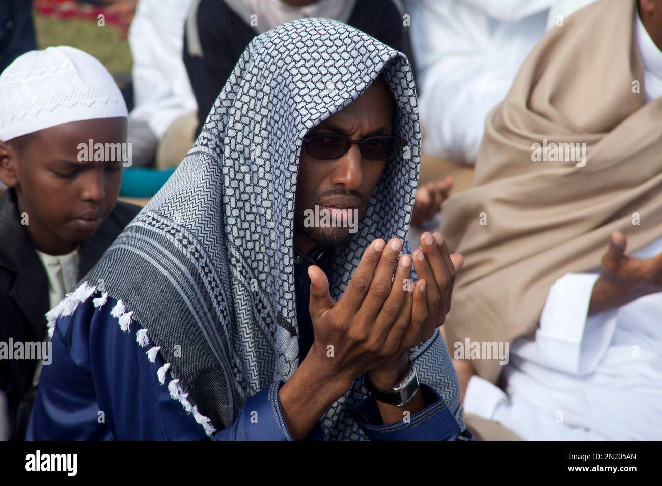 A Kenyan Muslim offers prayers in Nairobi, Kenya, Friday, July 17, 2015 ...