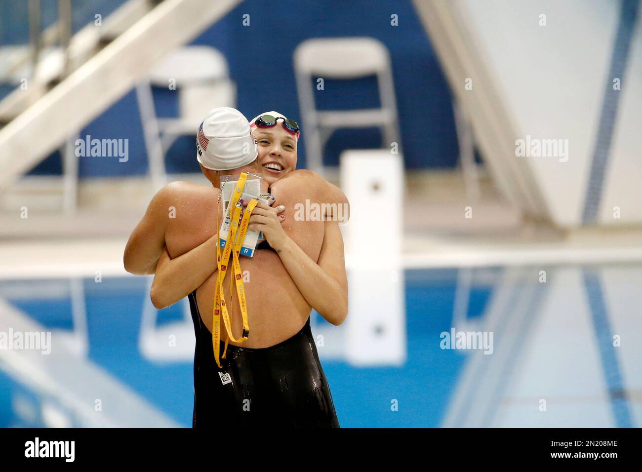 Gillian Ryan, left, and Kylie Stewart, both of the United States, hug ...