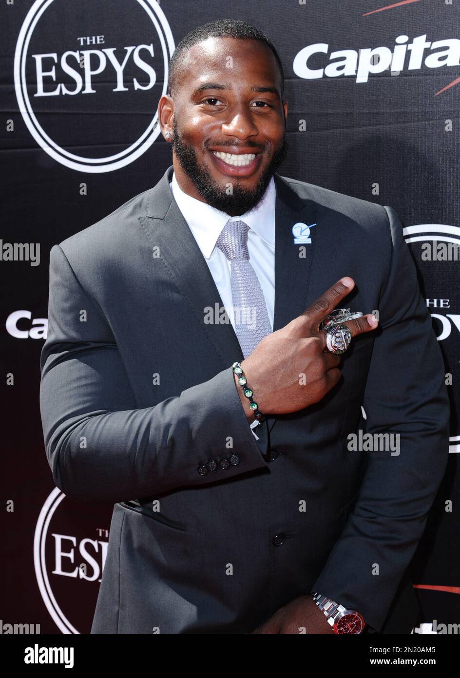 NFL player Jonas Gray, of the New England Patriots, arrives at the ESPY ...