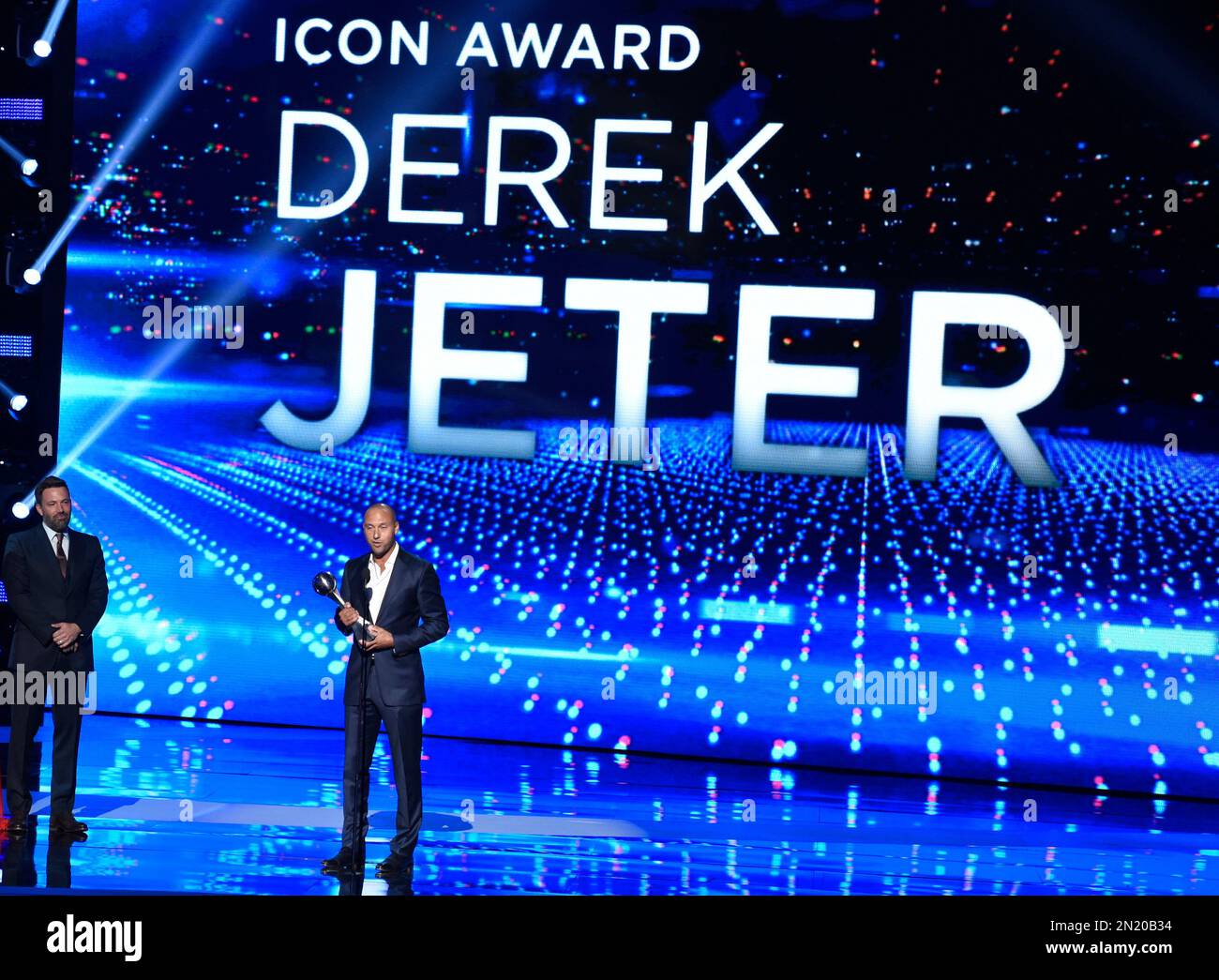 Ben Affleck, left, presents former professional baseball player Derek ...