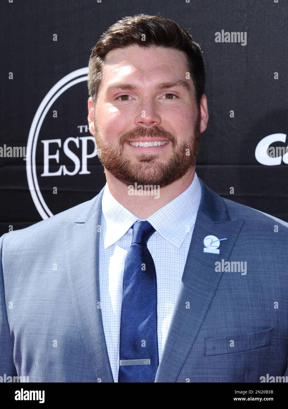 NFL player Dan Connolly, of the New England Patriots, arrives at the ESPY Awards at the ...