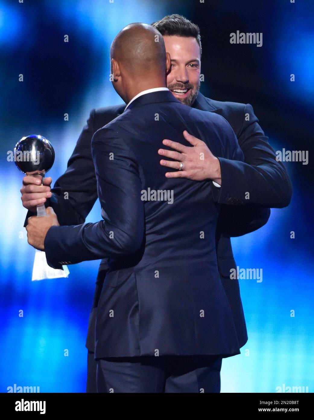 Ben Affleck, left, presents former professional baseball player Derek ...
