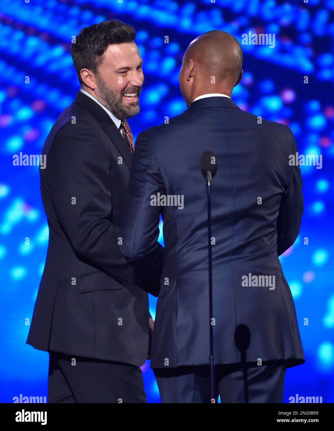 Ben Affleck, left, presents former professional baseball player Derek ...