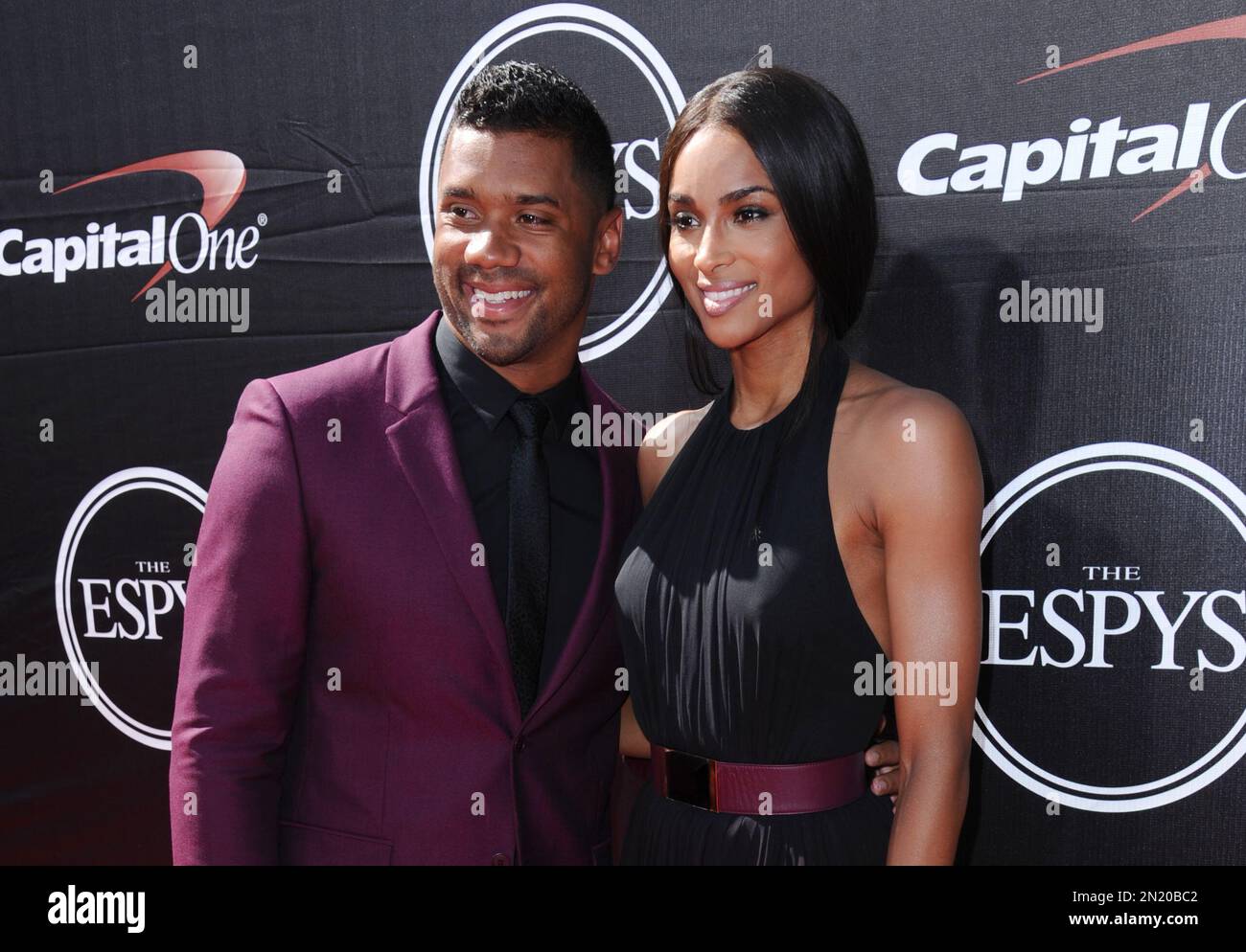 NFL player Russell Wilson, left, of the Seattle Seahawks, and musician ...