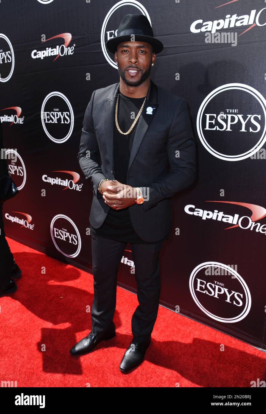 NFL player Andrew Hawkins, of the Cleveland Browns, arrives at the ESPY ...
