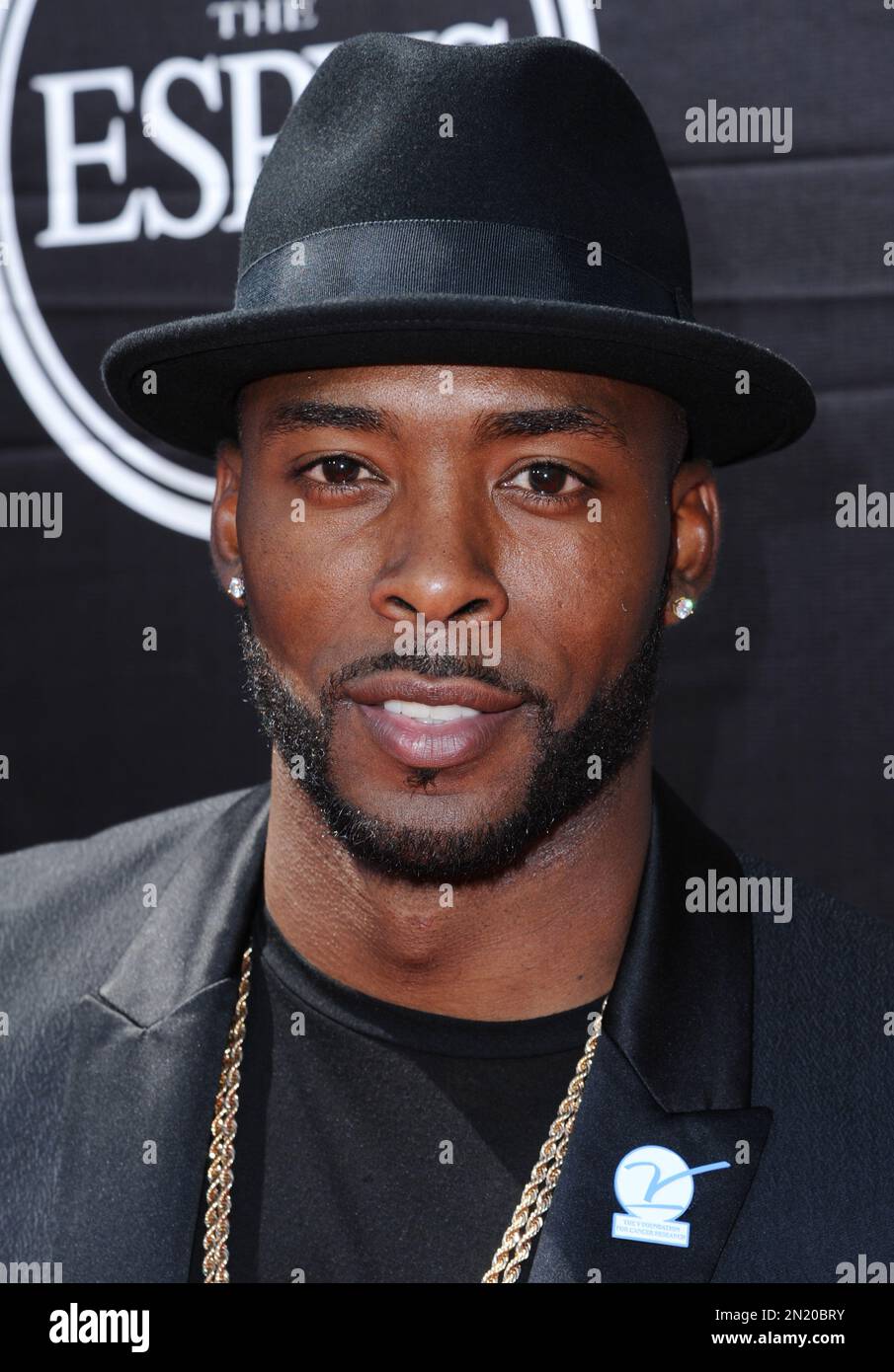 NFL player Andrew Hawkins, of the Cleveland Browns, arrives at the ESPY ...