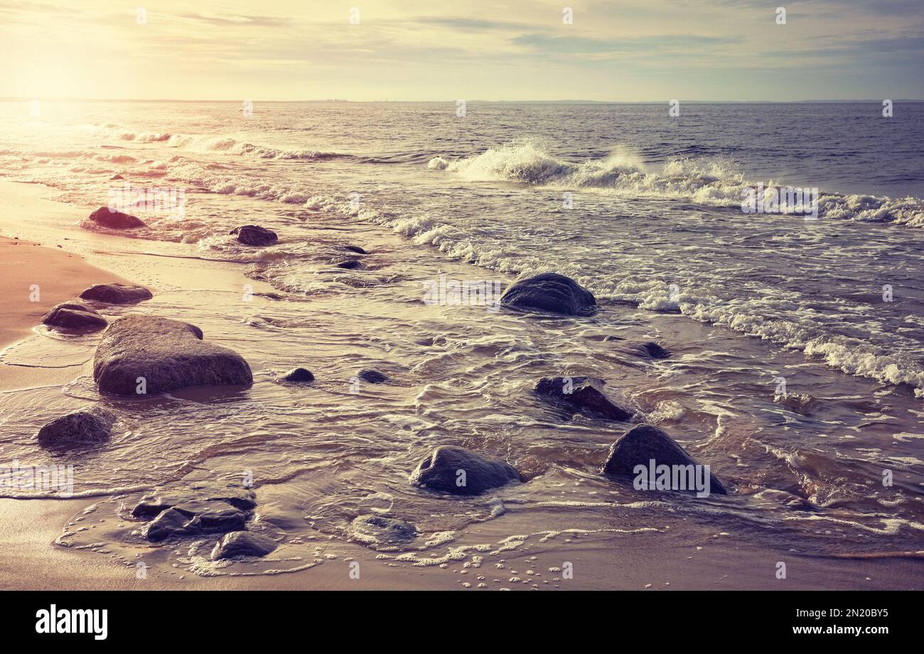 Baltic sea beach at sunset, color toning applied, Poland Stock Photo ...