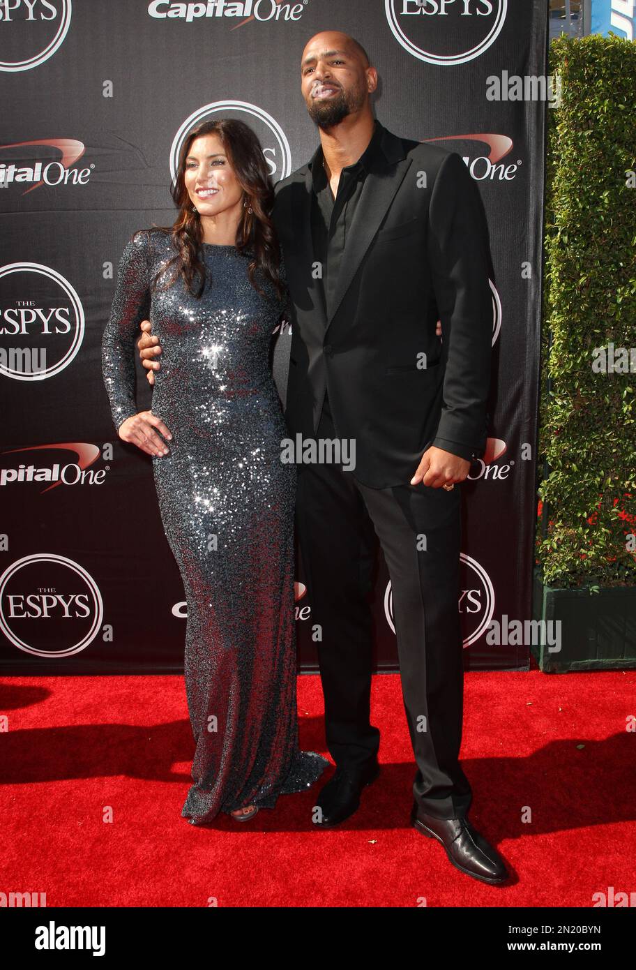 Hope Solo of U.S. woman's national team, left, and former football ...