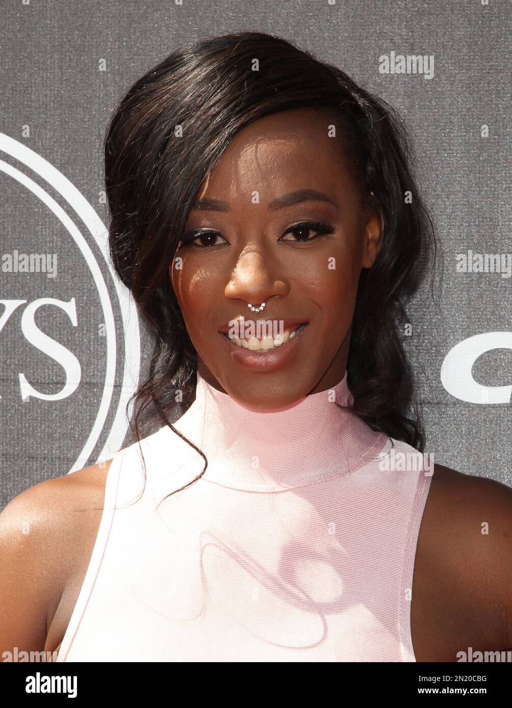 Volleyball player Destinee Hooker arrives at the ESPY Awards at the ...