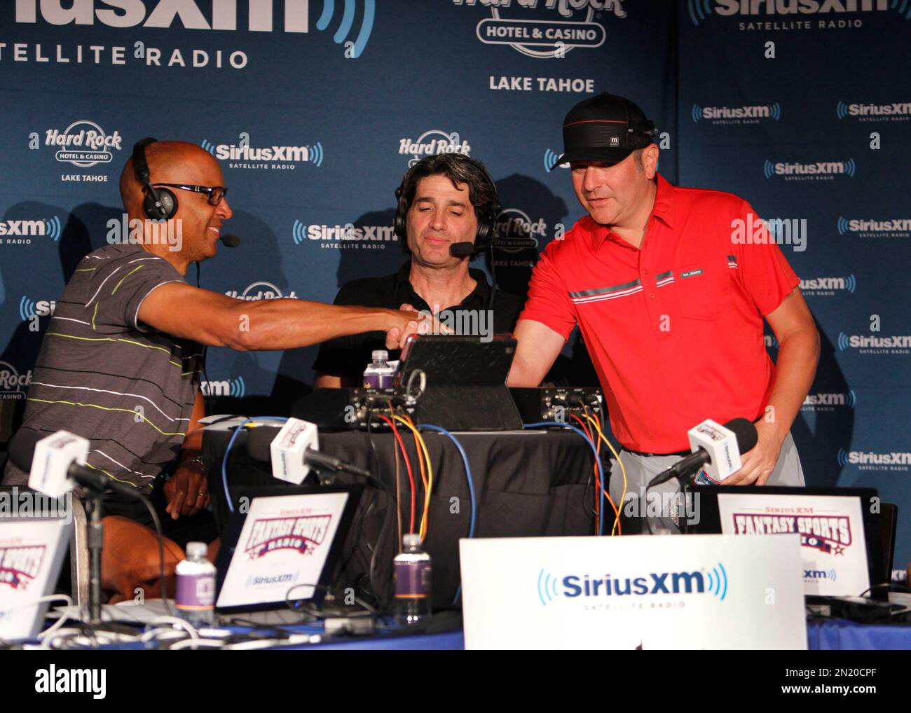 James Lofton, left, and Bruce Murray welcome Rascal Flatts bassist Jay ...