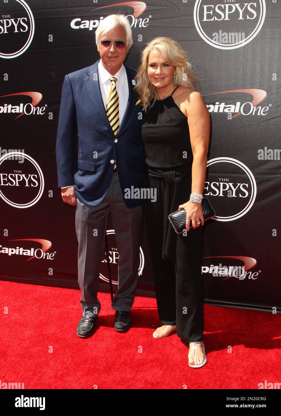 Bob Baffert, Triple Crown winning American horse trainer, left, and ...