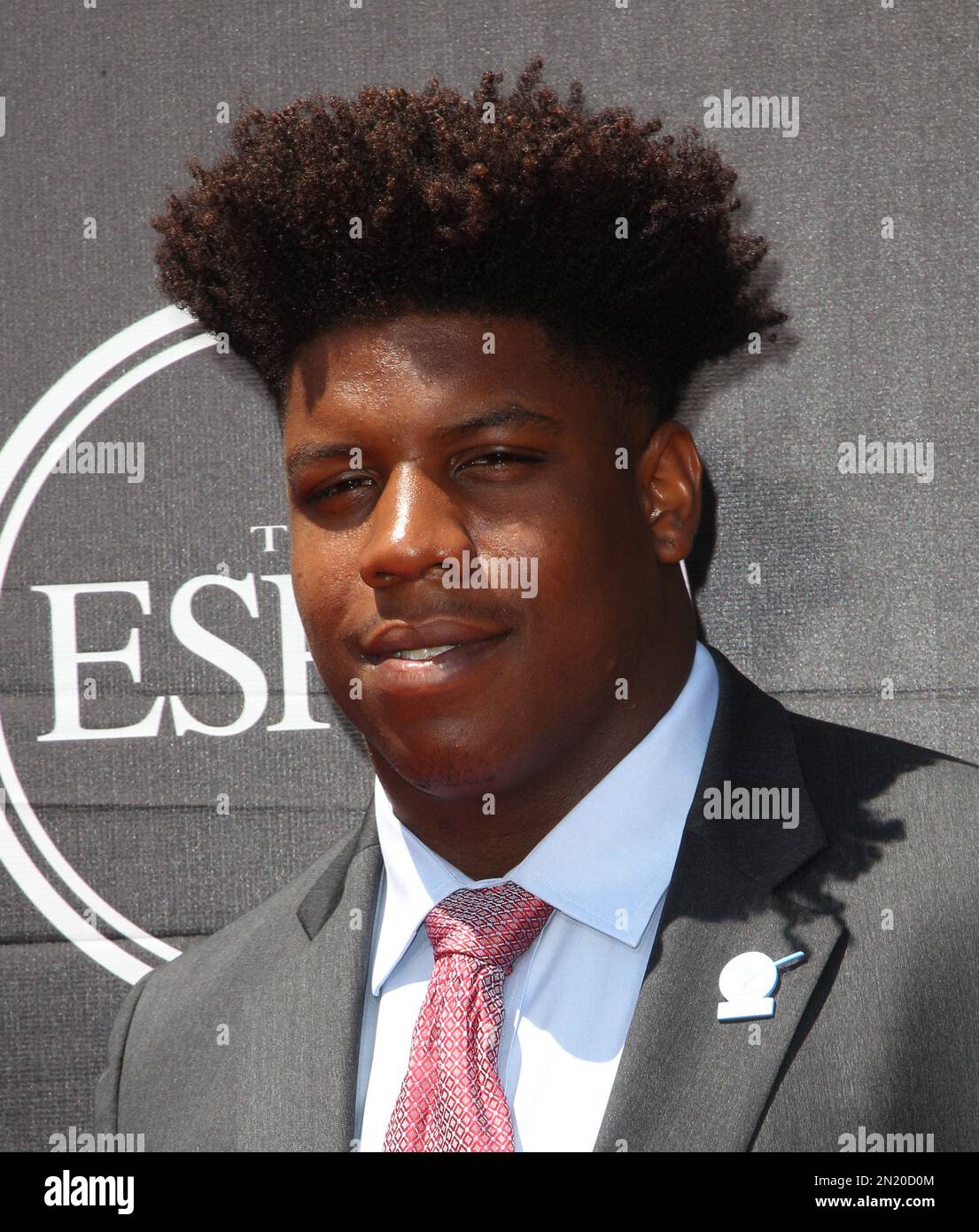NFL player Robert Myers, of the Baltimore Ravens, arrives at the ESPY ...