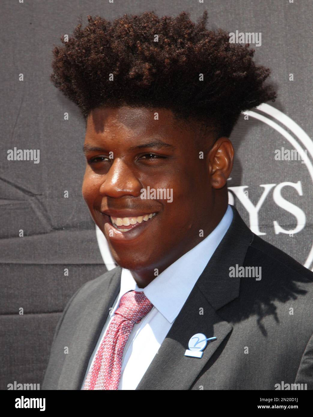 NFL player Robert Myers, of the Baltimore Ravens, arrives at the ESPY ...