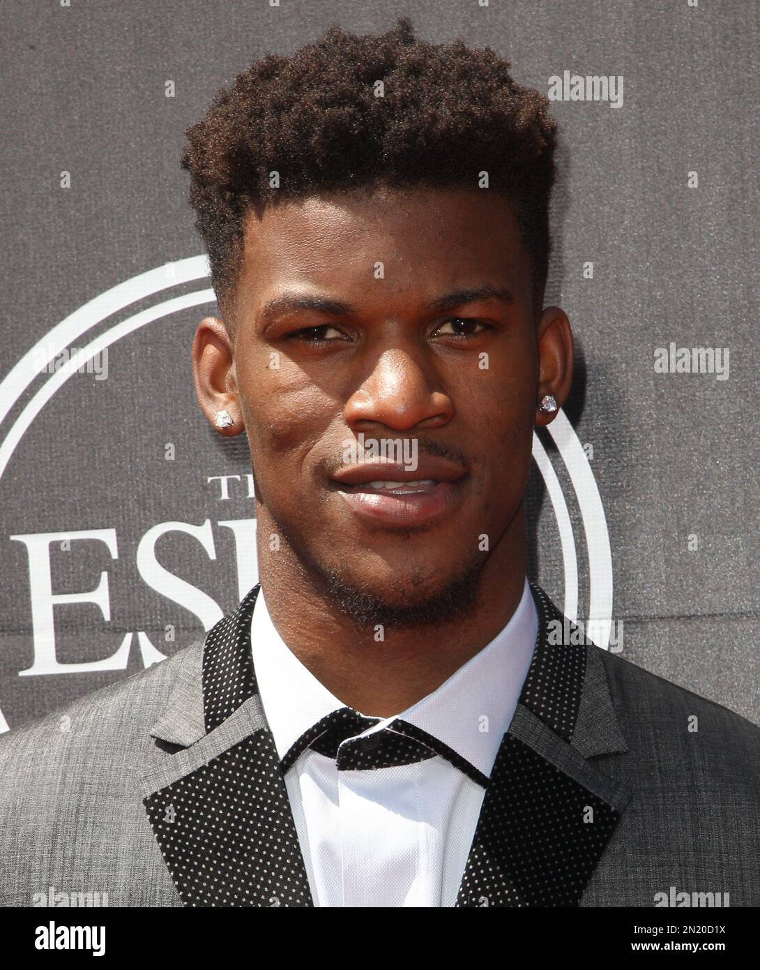 NFL player Jimmy Butler, of the Chicago Bulls, arrives at the ESPY ...
