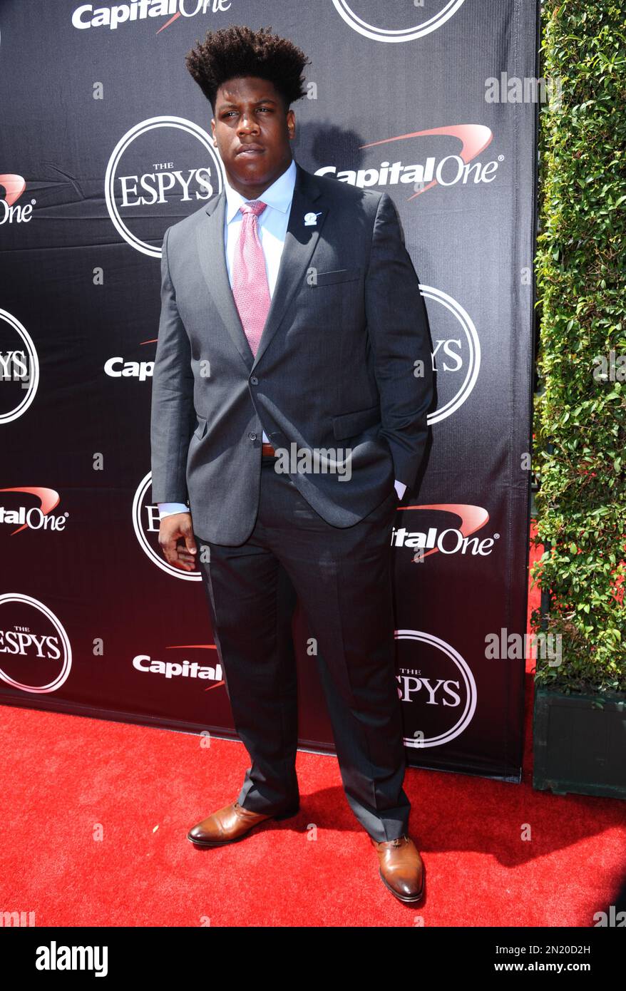 NFL player Robert Myers, of the Baltimore Ravens, arrives at the ESPY ...