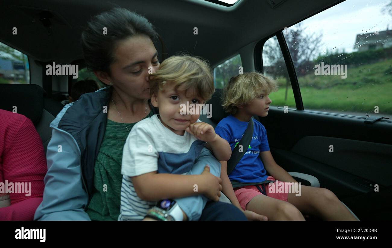 Kids in car back seat mother and child inside vehicle transportation ...
