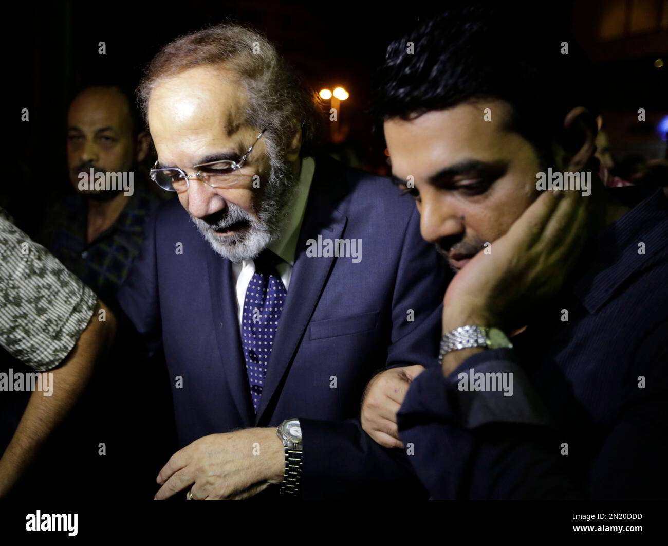 Egyptian actor Mahmoud Yassin, left, attends a condolences ceremony for ...